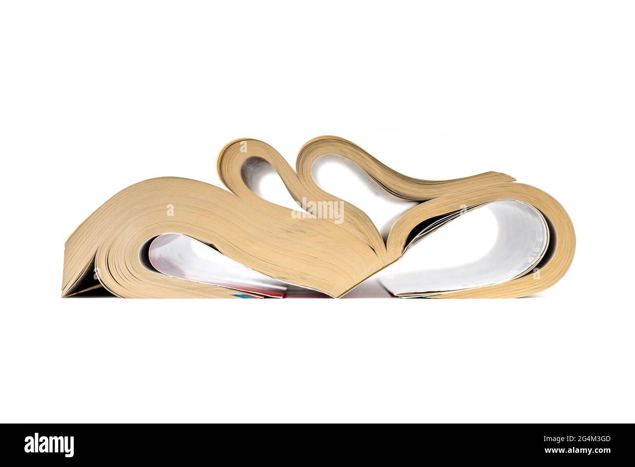 Closeup a thick book isolated on white background Stock Photo - Alamy