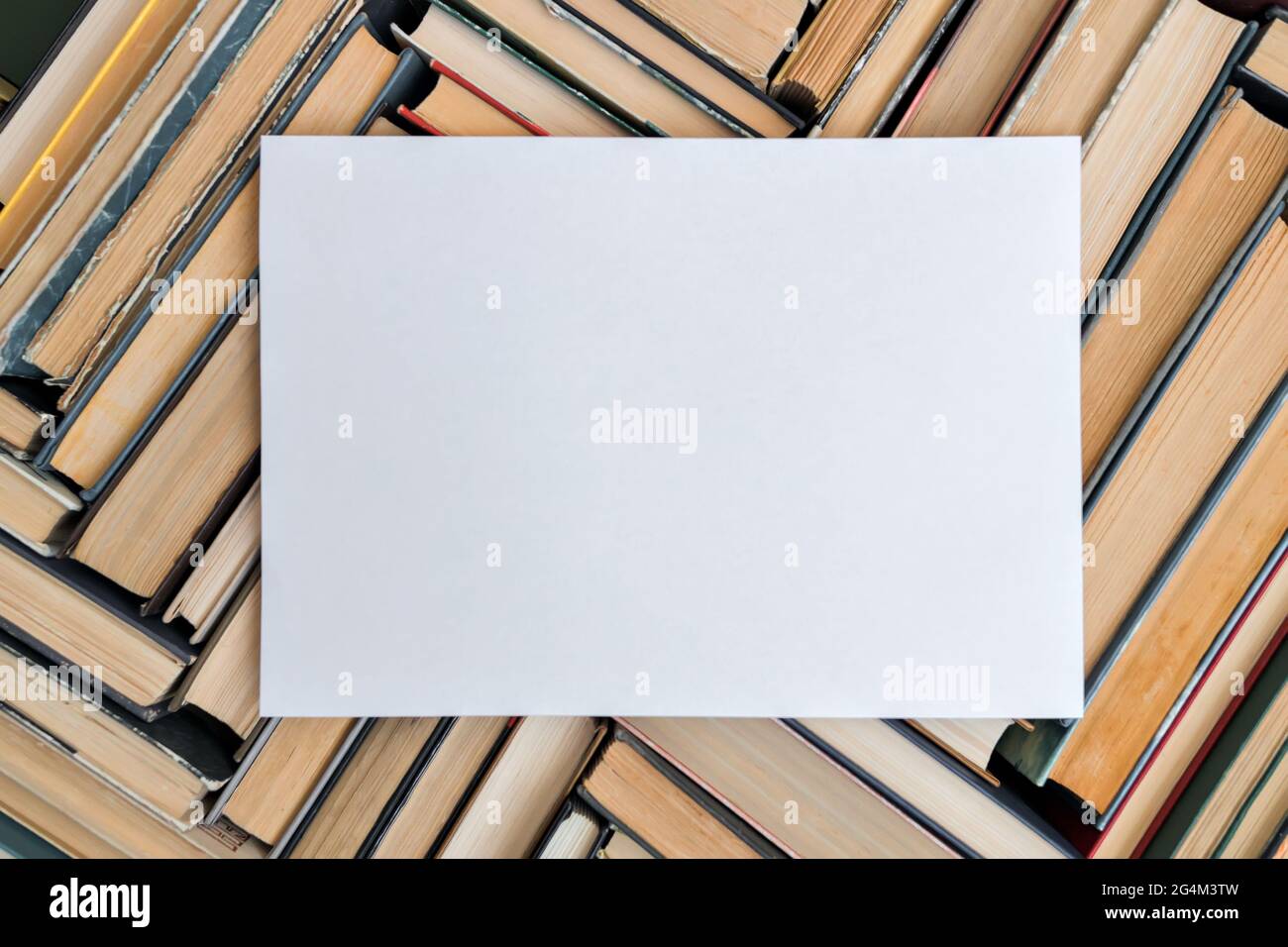 A pattern of old books with a top view. Solid background with copy ...