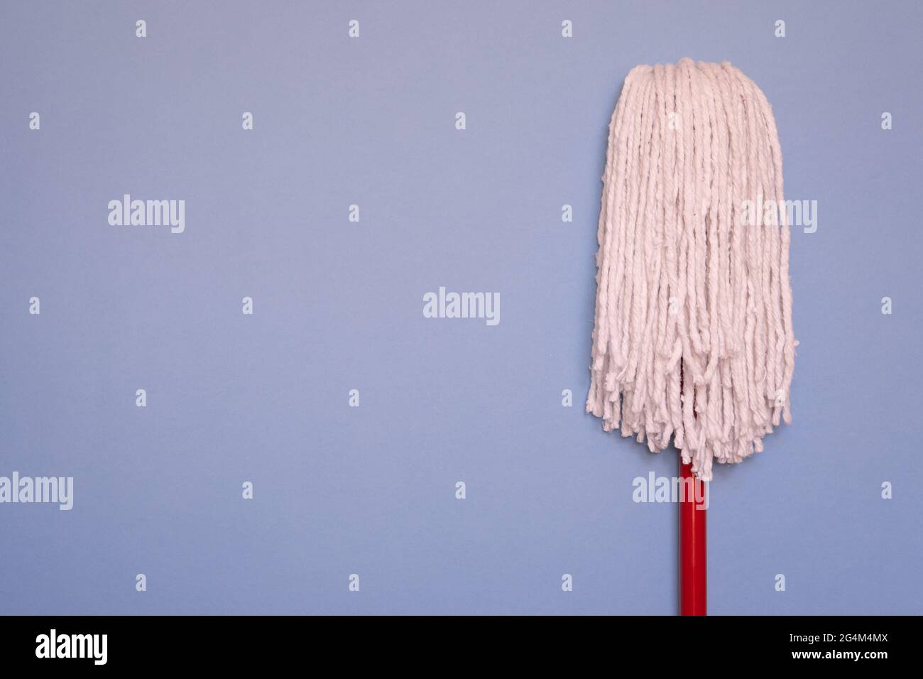 Mop head at the wall after cleaning Stock Photo - Alamy