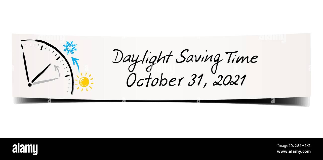 Daylight Saving Time October 31, 2021. Paper banner with hand written ...