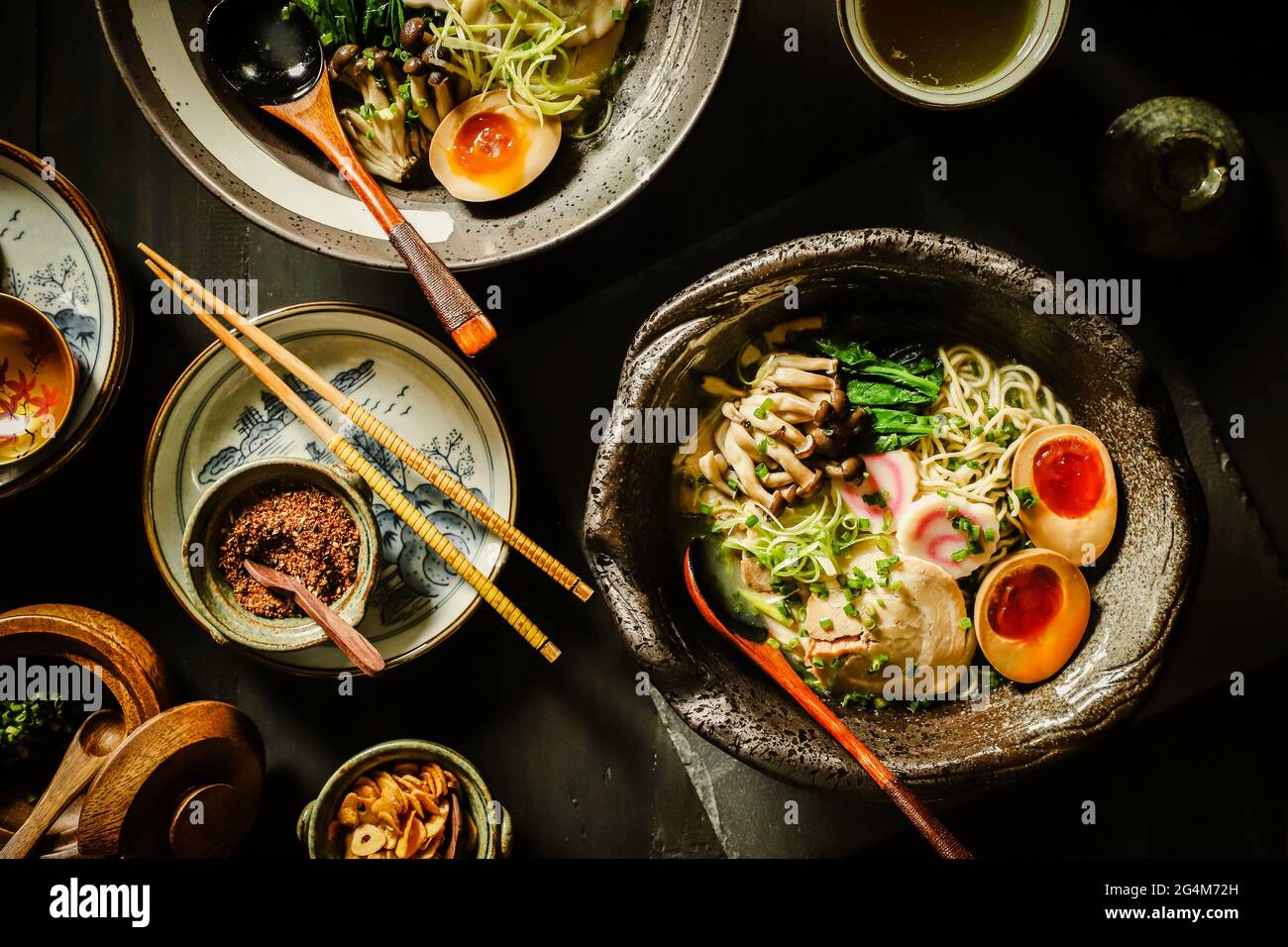 Ramen. Japanese yellow noodle soup with pork belly, soy egg, fish cake ...