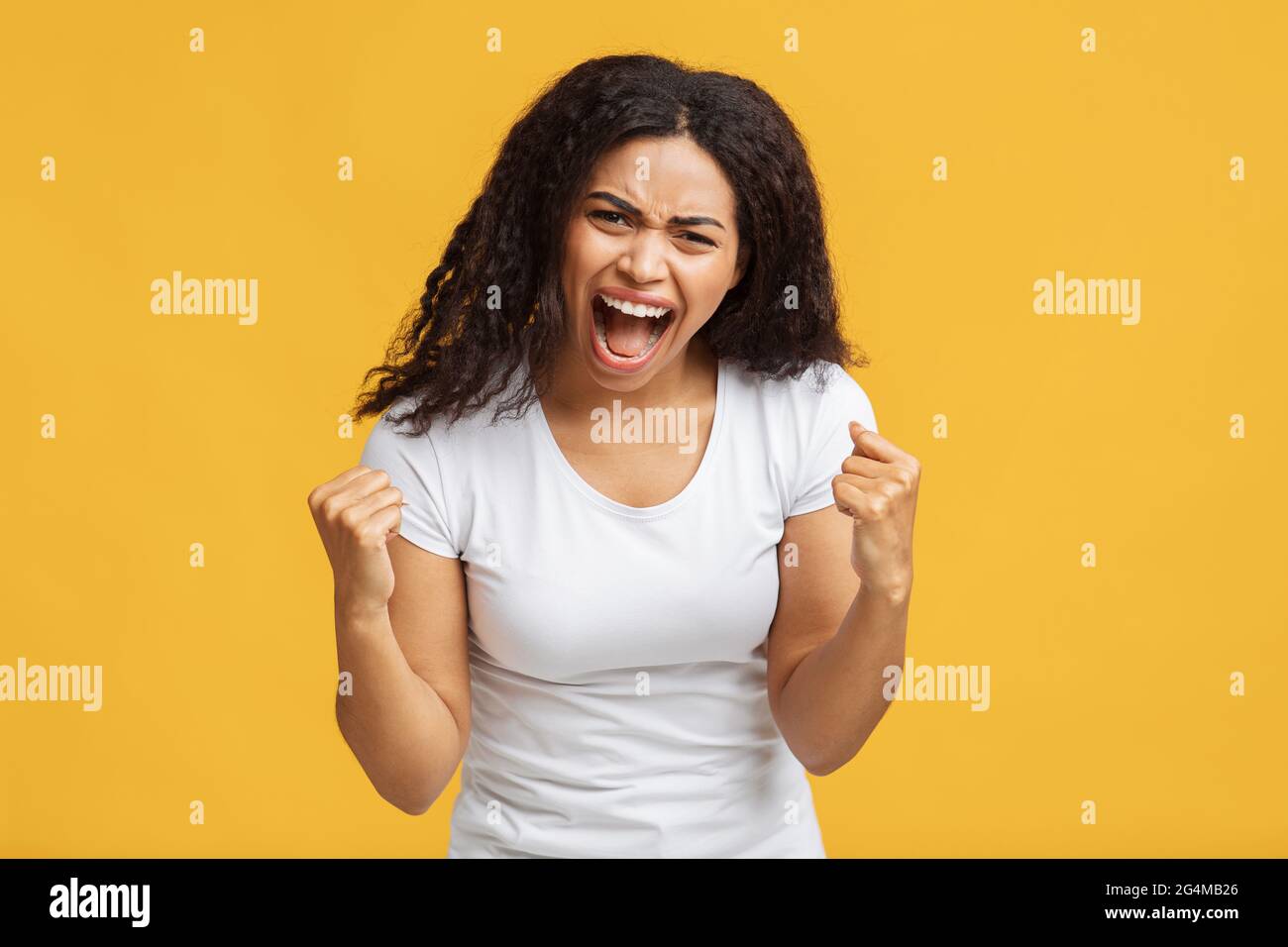 Emotions, madness and people concept. Angry black woman screaming and ...
