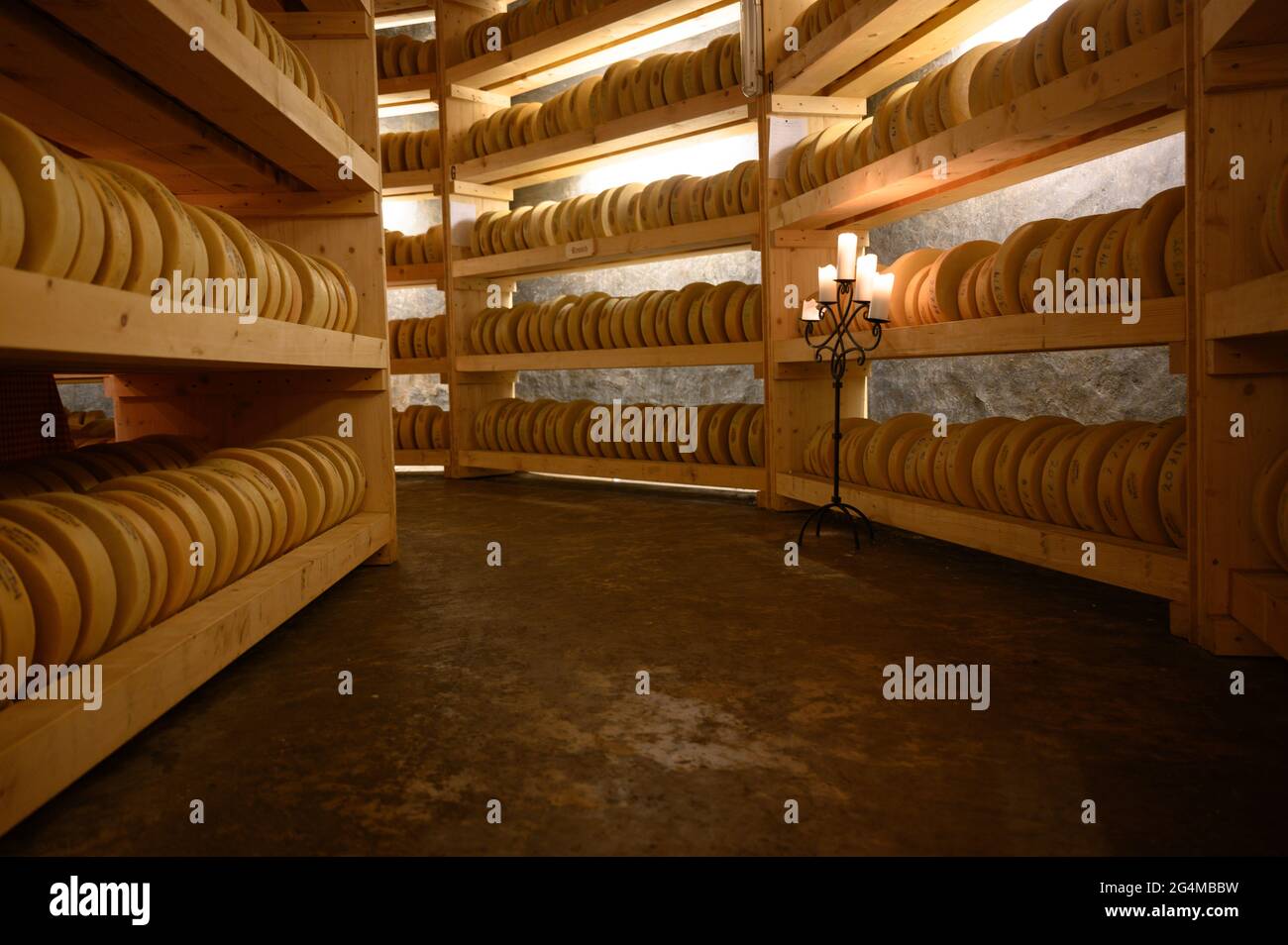 swiss cheese storage in Gstaadt Stock Photo - Alamy