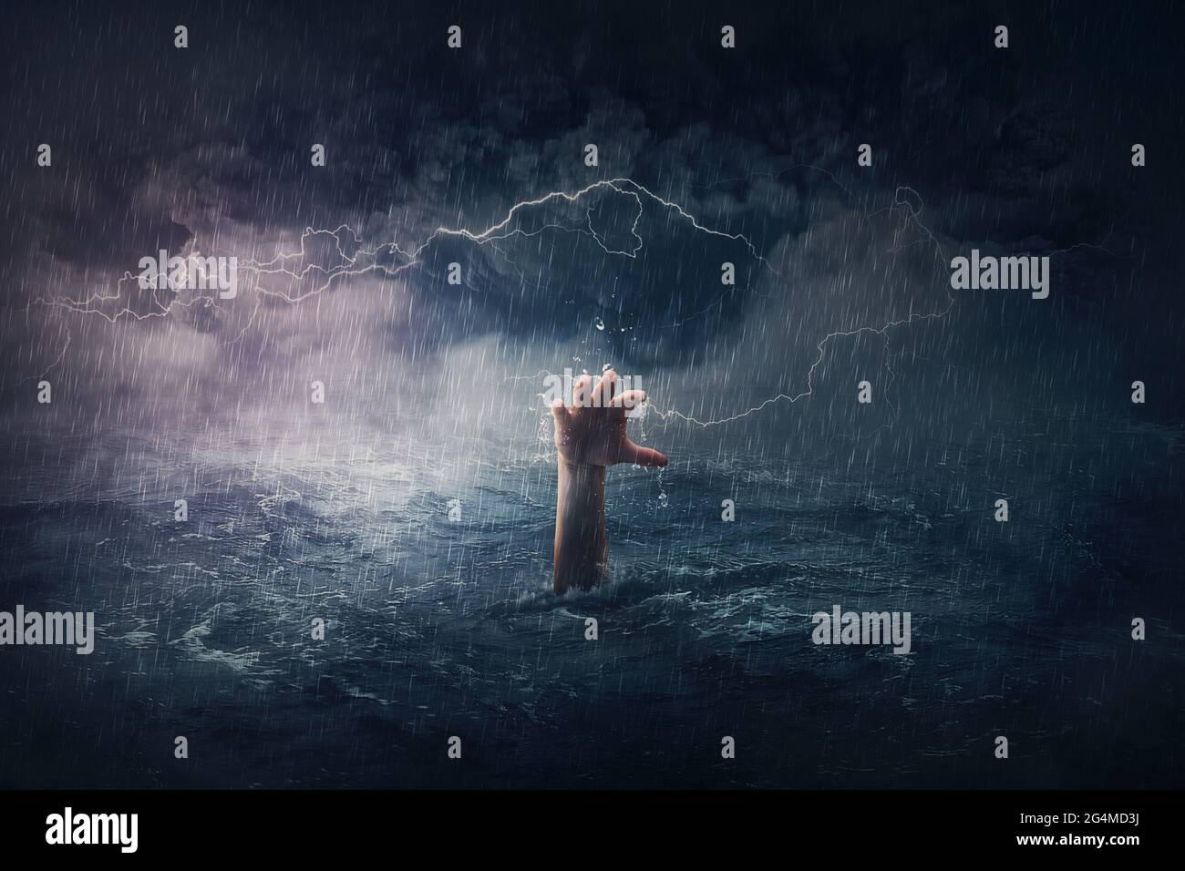 Arm drowning in the sea. Surreal and dramatic scene of person hand ...