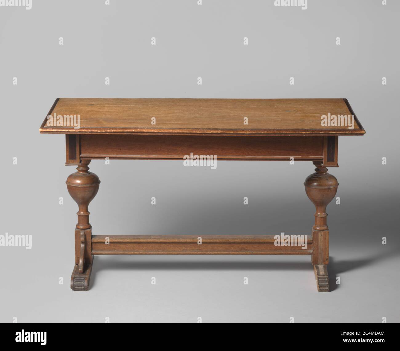 Table on two legs. Table of oak, on two legs Stock Photo - Alamy