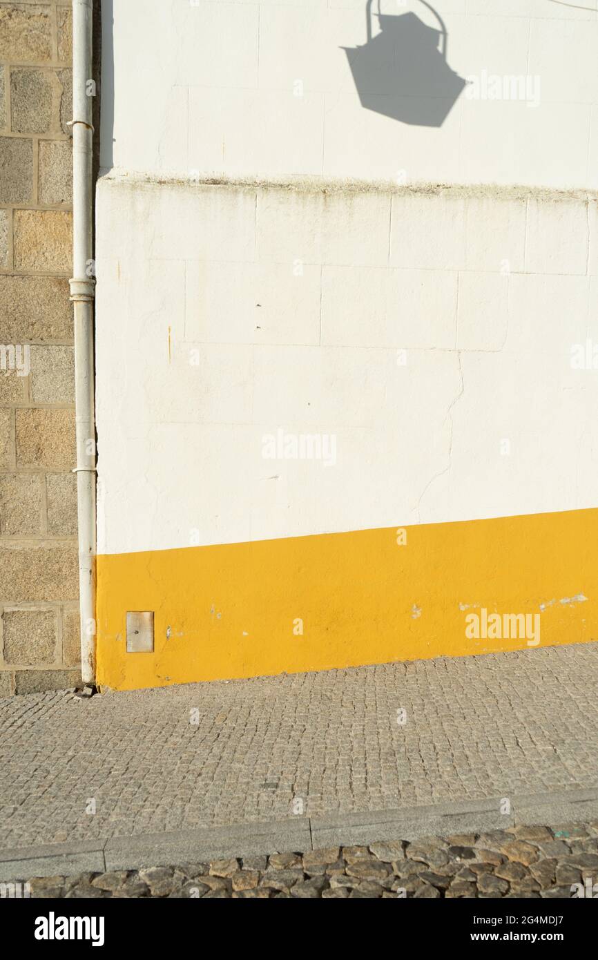 shadow detail on white and yellow wall Stock Photo - Alamy