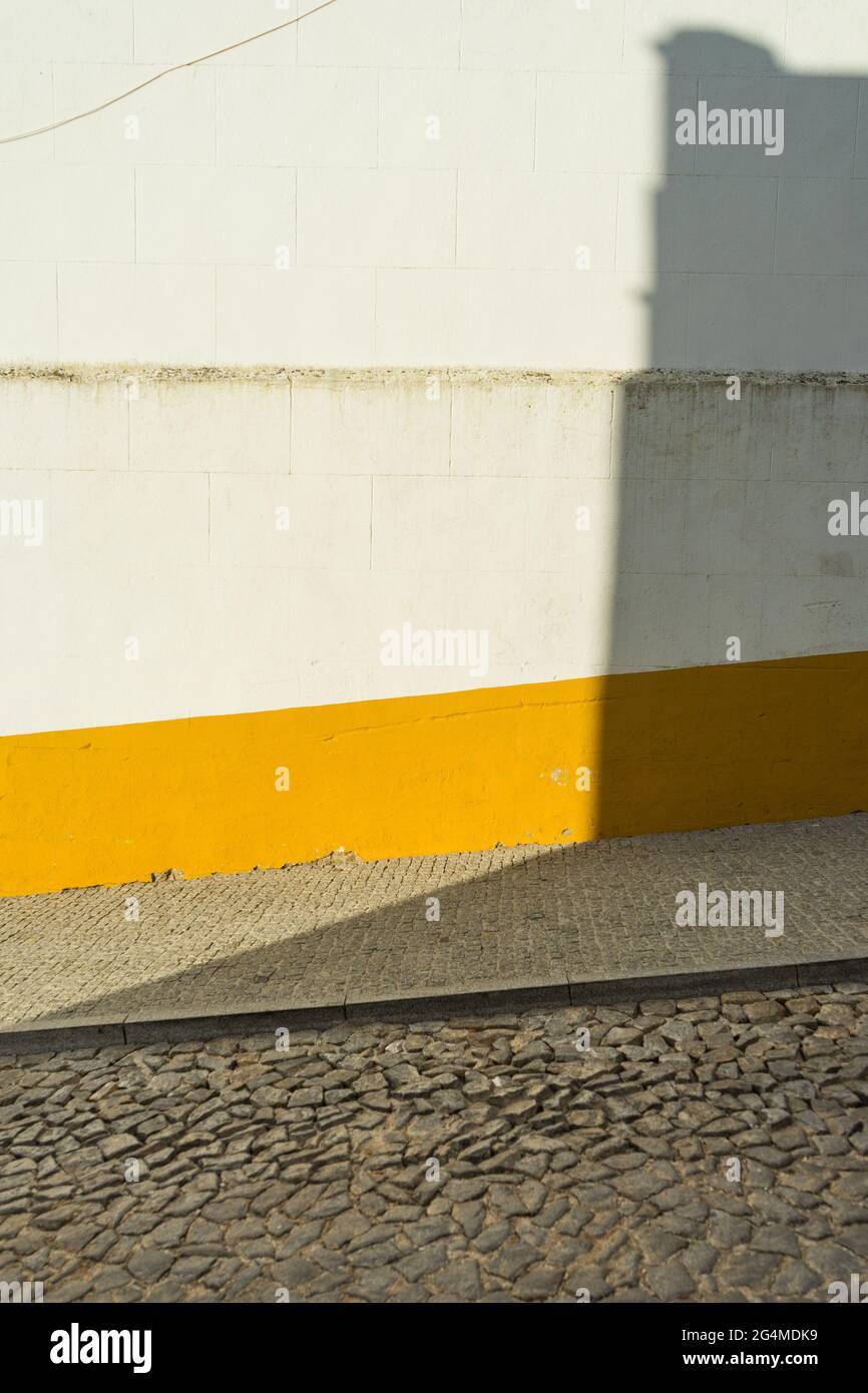 shadow detail on white and yellow wall Stock Photo - Alamy