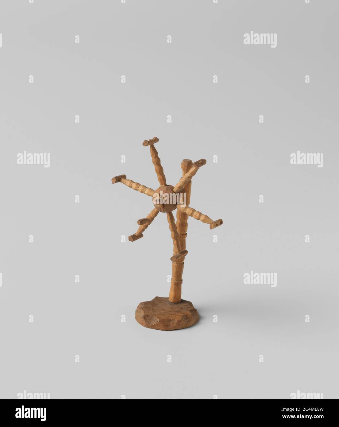 Yarn reel on round foot. Yarn reel with a round bottom of walnut. The ...