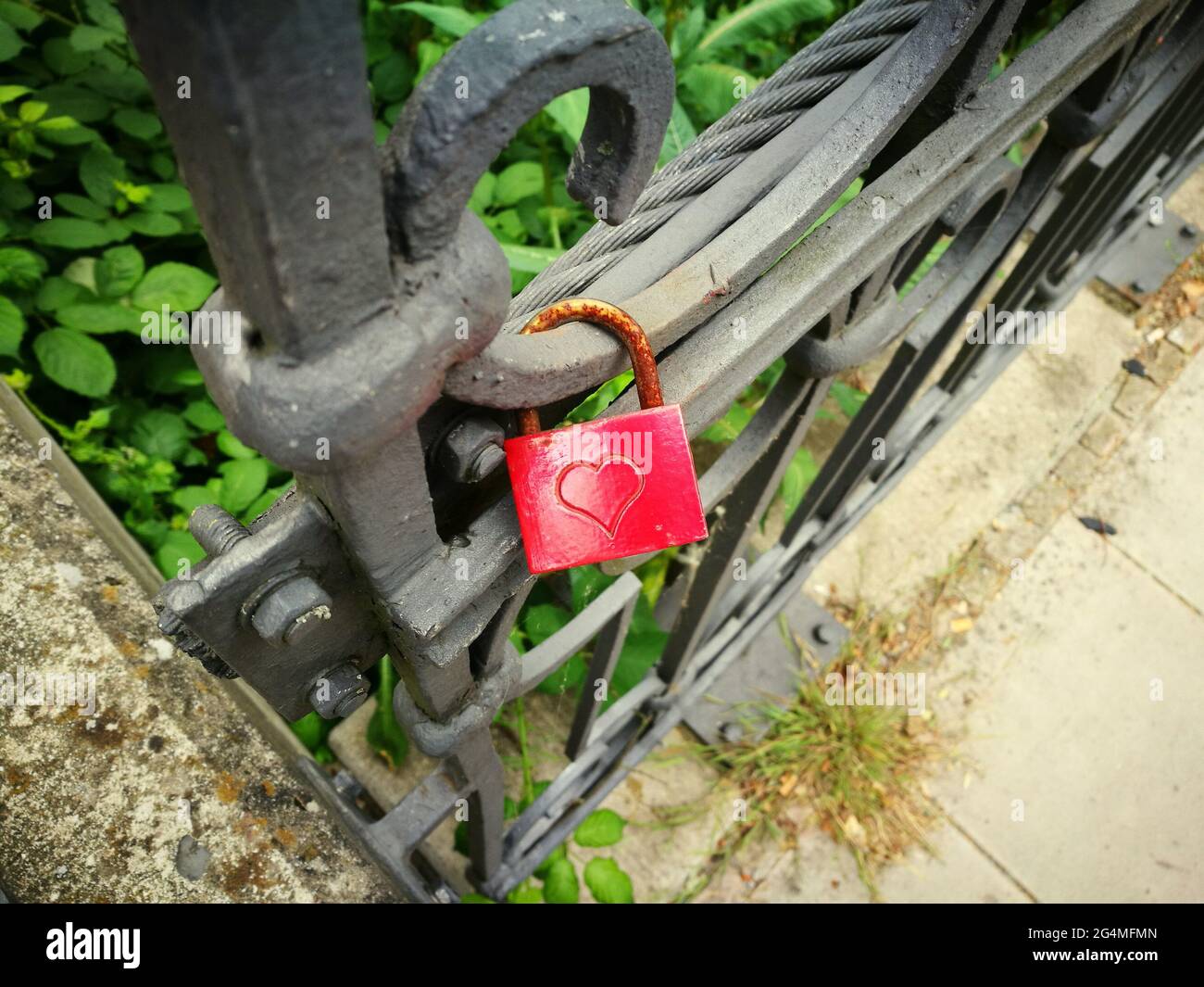 Lock of love on a bridge metal fence Stock Photo - Alamy