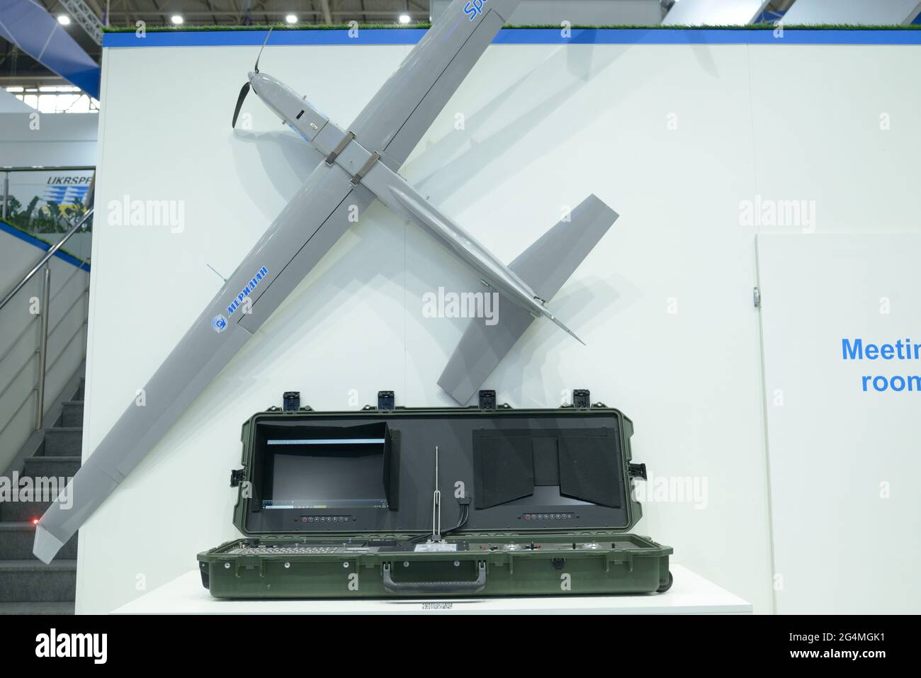 Military unmanned aerial vehicle and remote control panel set on a ...