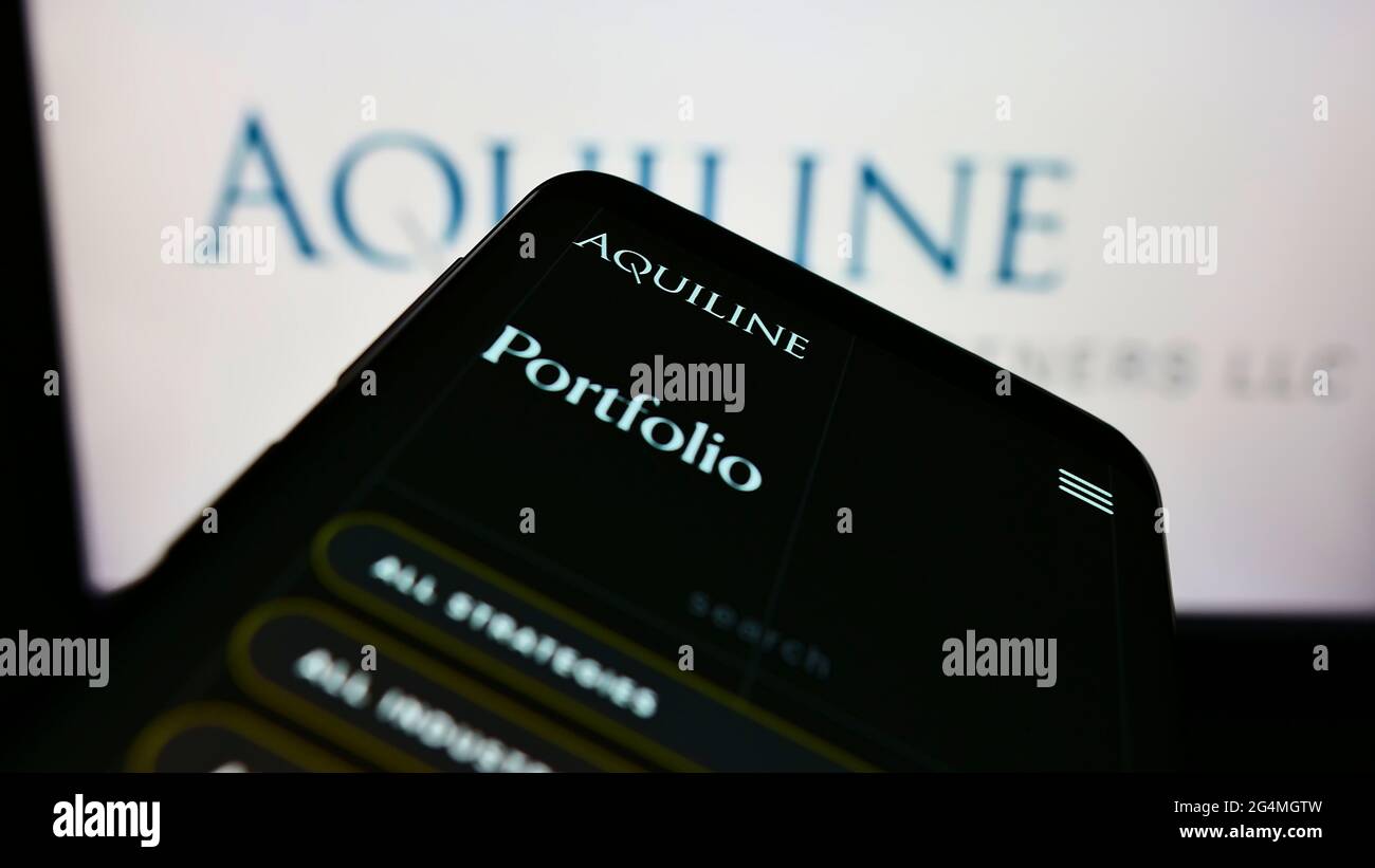 Mobile phone with website of US private equity firm Aquiline Capital ...