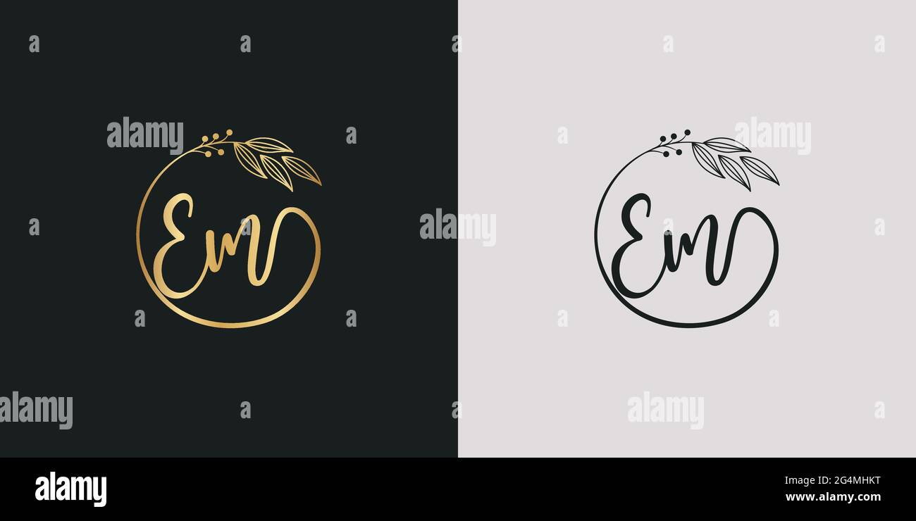 luxury golden signature letter E and m isolated circle with leaves ...