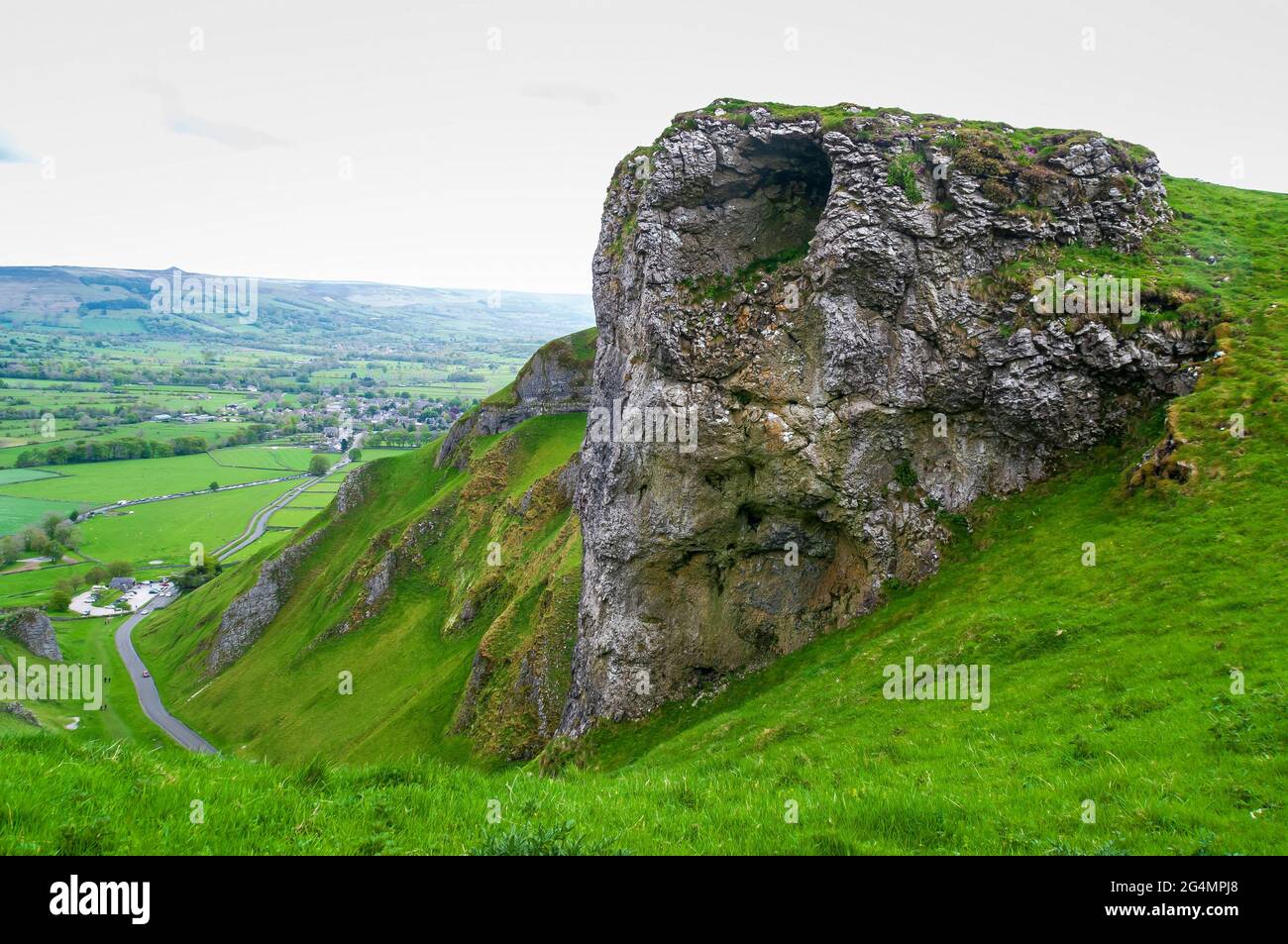 Mineralised natural cavity in an outcrop of reef limestone high in ...
