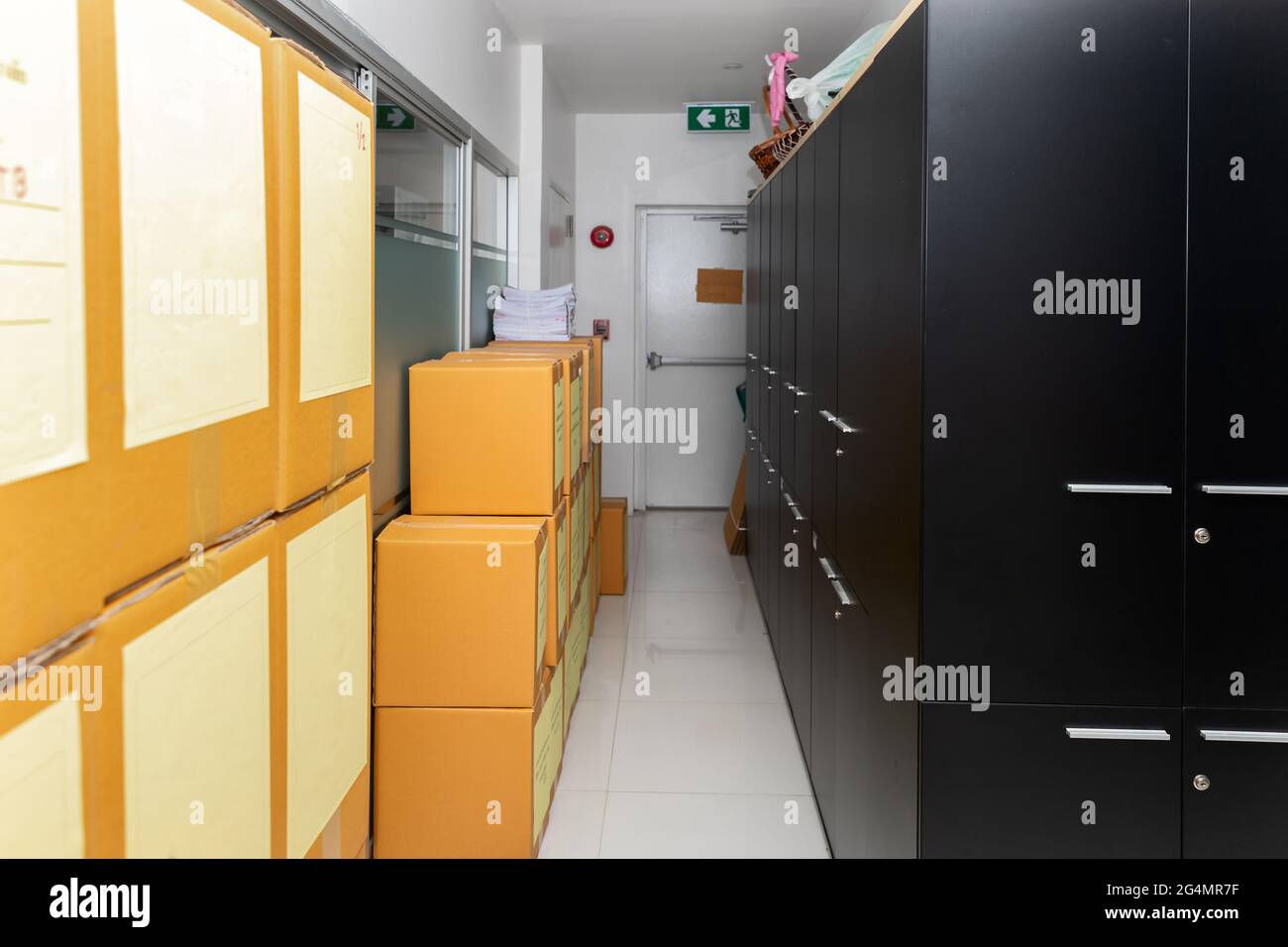 Cardboard box with products and file cabinet in the warehouse Stock ...