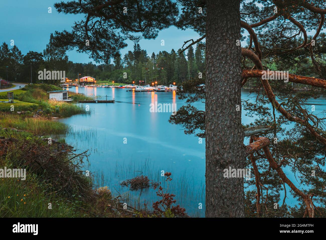 Sweden. Road To Beautiful Swedish Village near Lake. Wooden Log Cabin ...