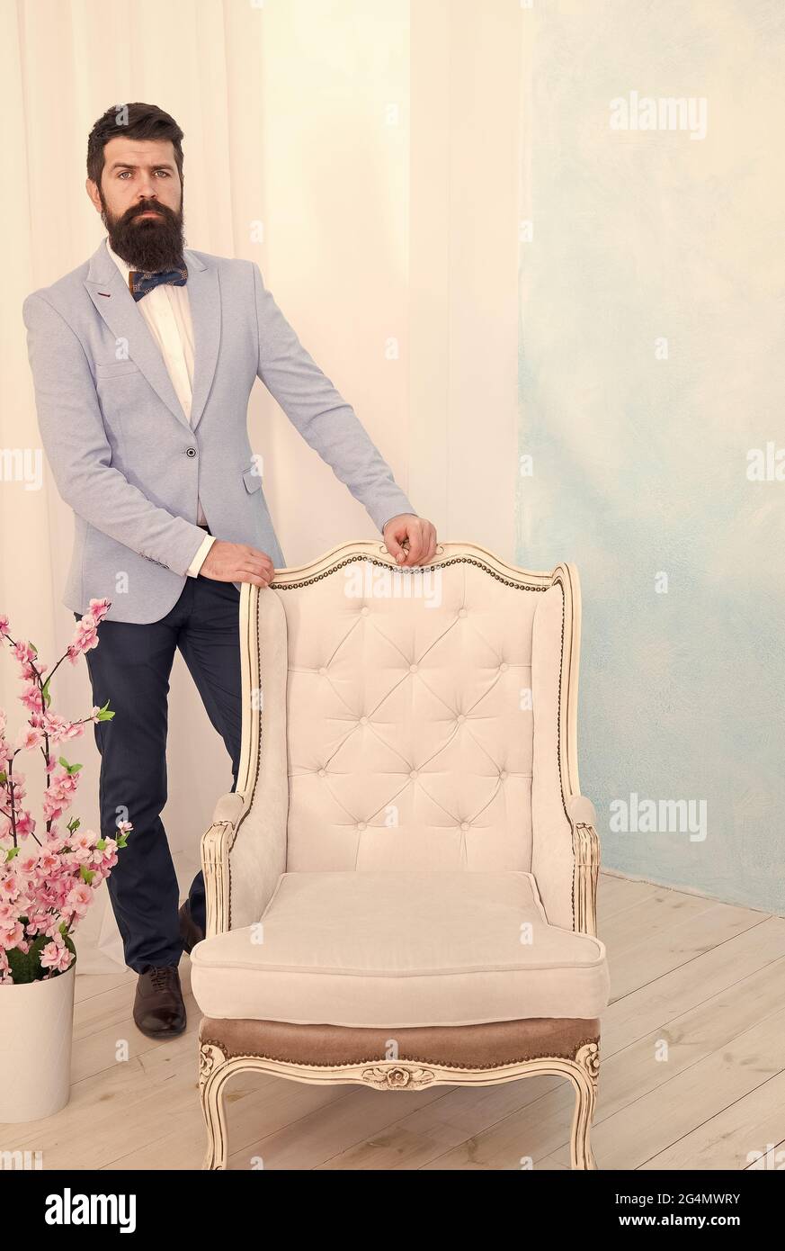 Gentleman elegant man wear classic suit bow tie, impeccable outfit ...