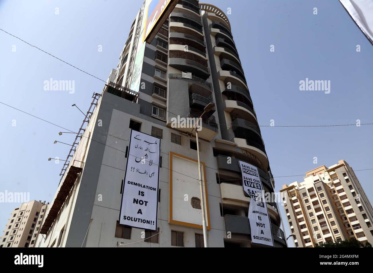 View of banners seen hanging on Nasla Tower against the demolition ...