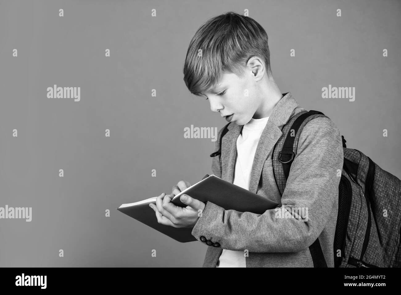 Enriching life with knowledge. Boy student brown background. Small ...