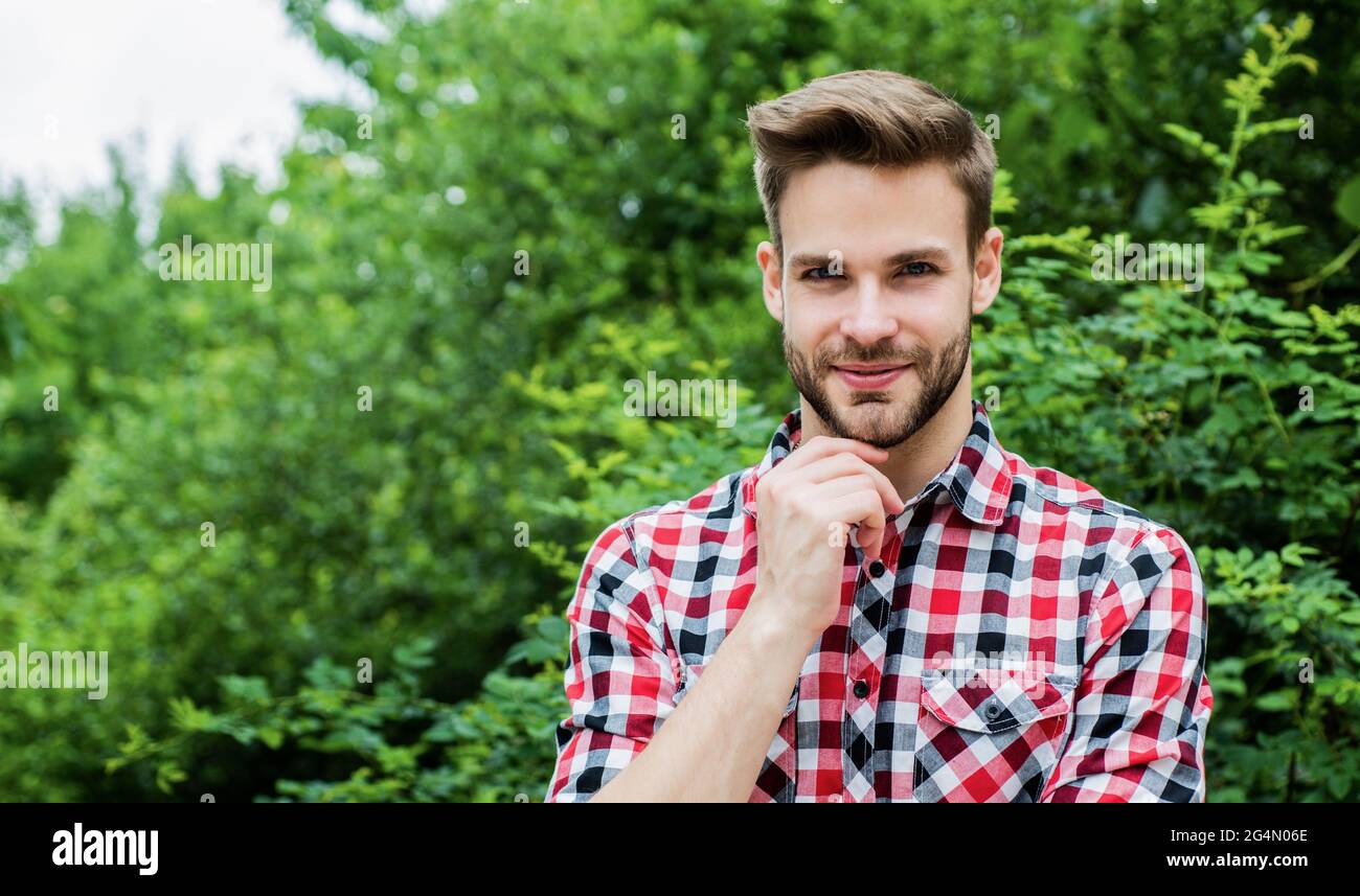 young guy with unshaven face and stylish hair, style Stock Photo - Alamy