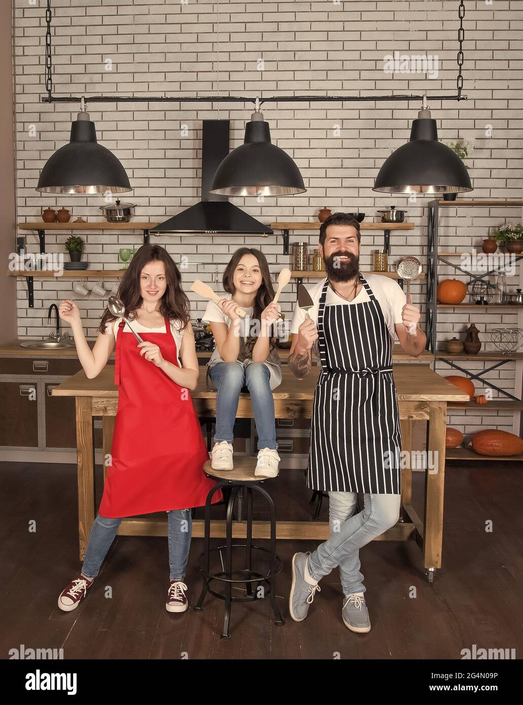 Happy family cooking holiday meals together, kitchen team concept Stock ...