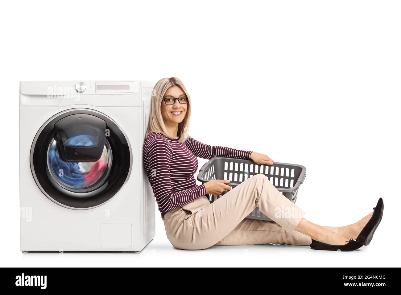 Girl sitting on washing machine hi-res stock photography and images - Alamy
