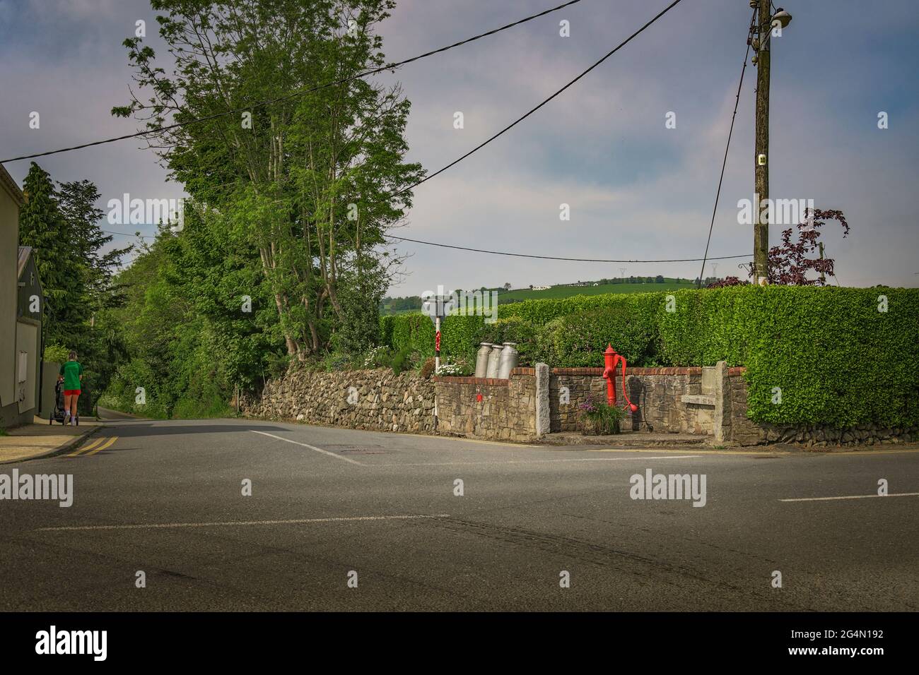 Irish Landscape. Crossroads in countryside village with the water pump ...