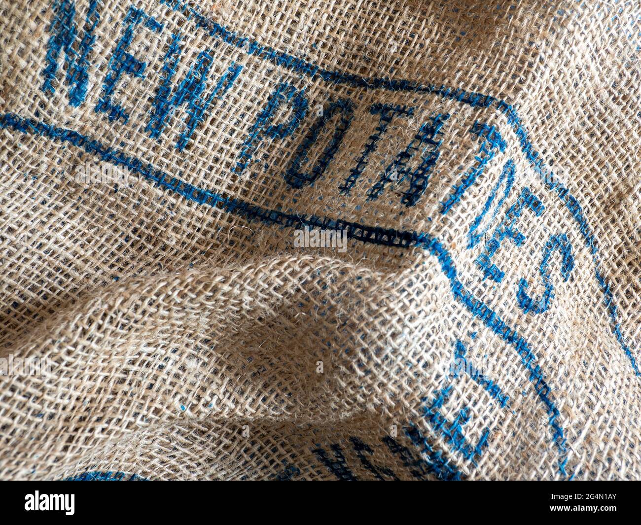 new potato storage sack with blue text Stock Photo - Alamy