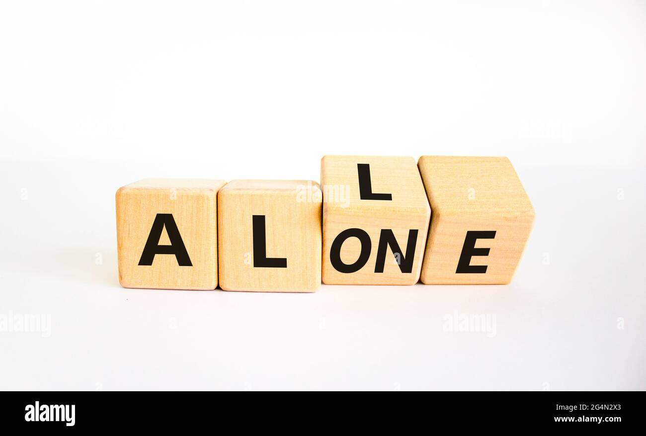 All or alone and support symbol. Turned the wooden cube and changed the ...