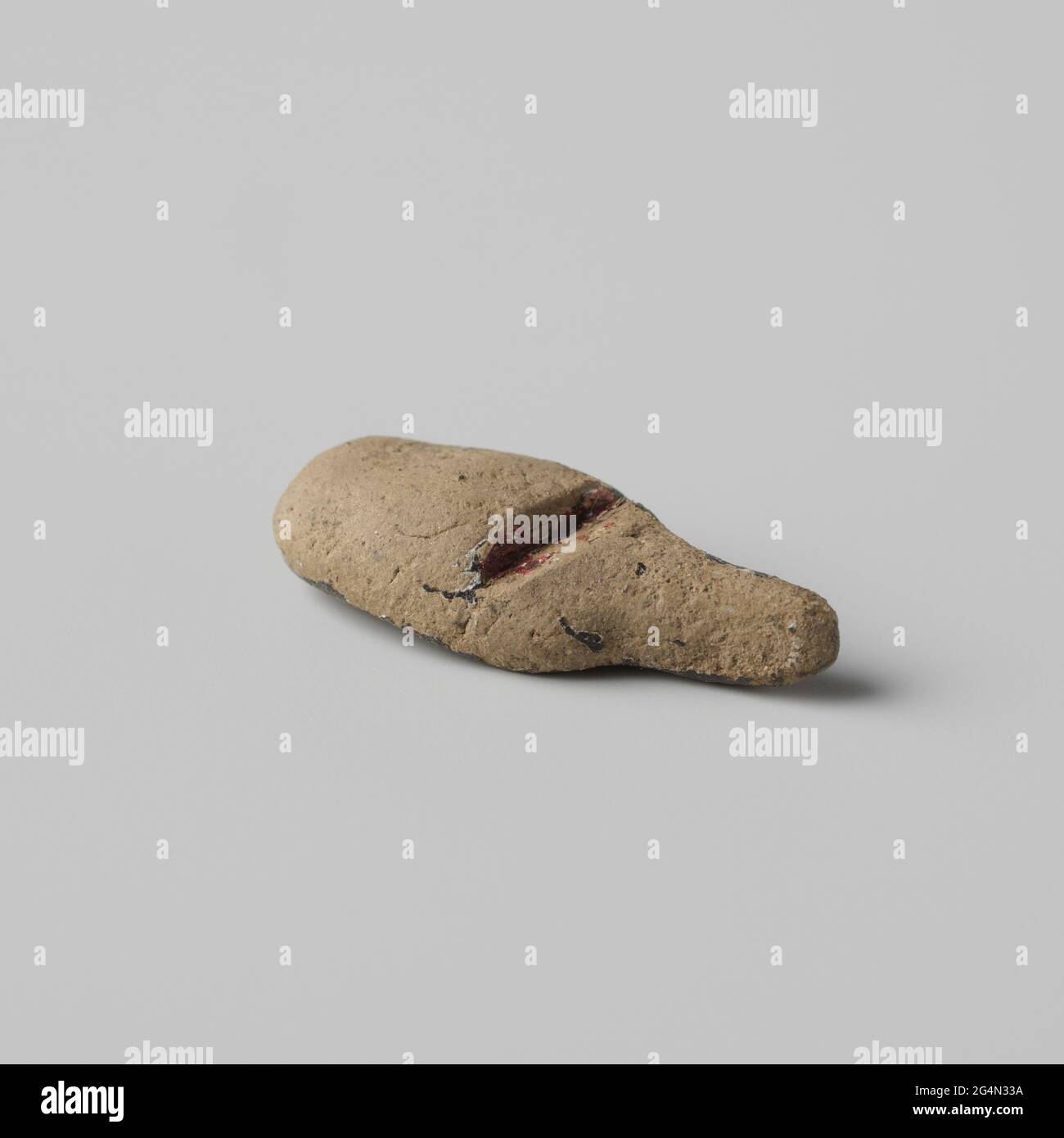 Ham. Ham made from brown clay, originally brunette and painted red at ...