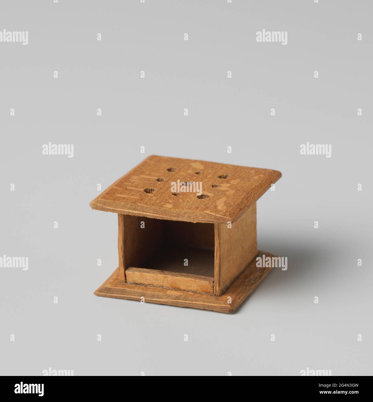 Stew, square with nine holes. A square stove from beech wood with nine ...