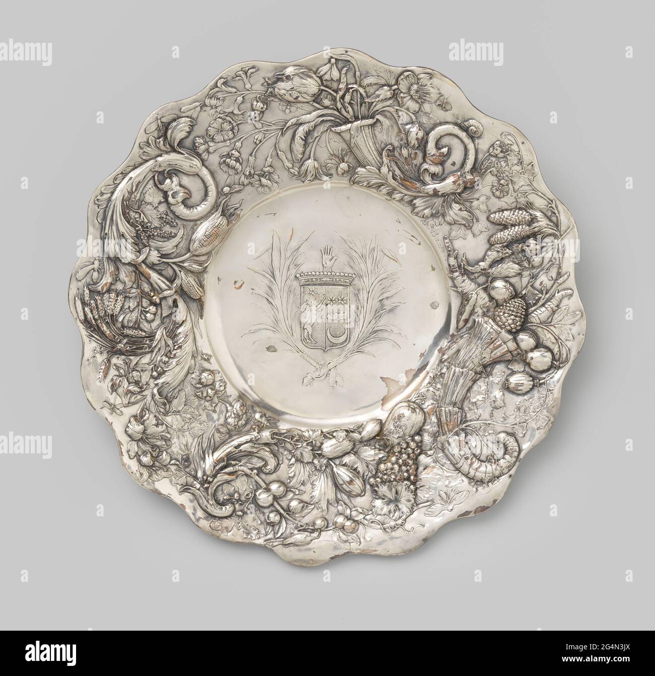 Galvanoplastic reproduction of a dish with a coat of arms on the flat ...