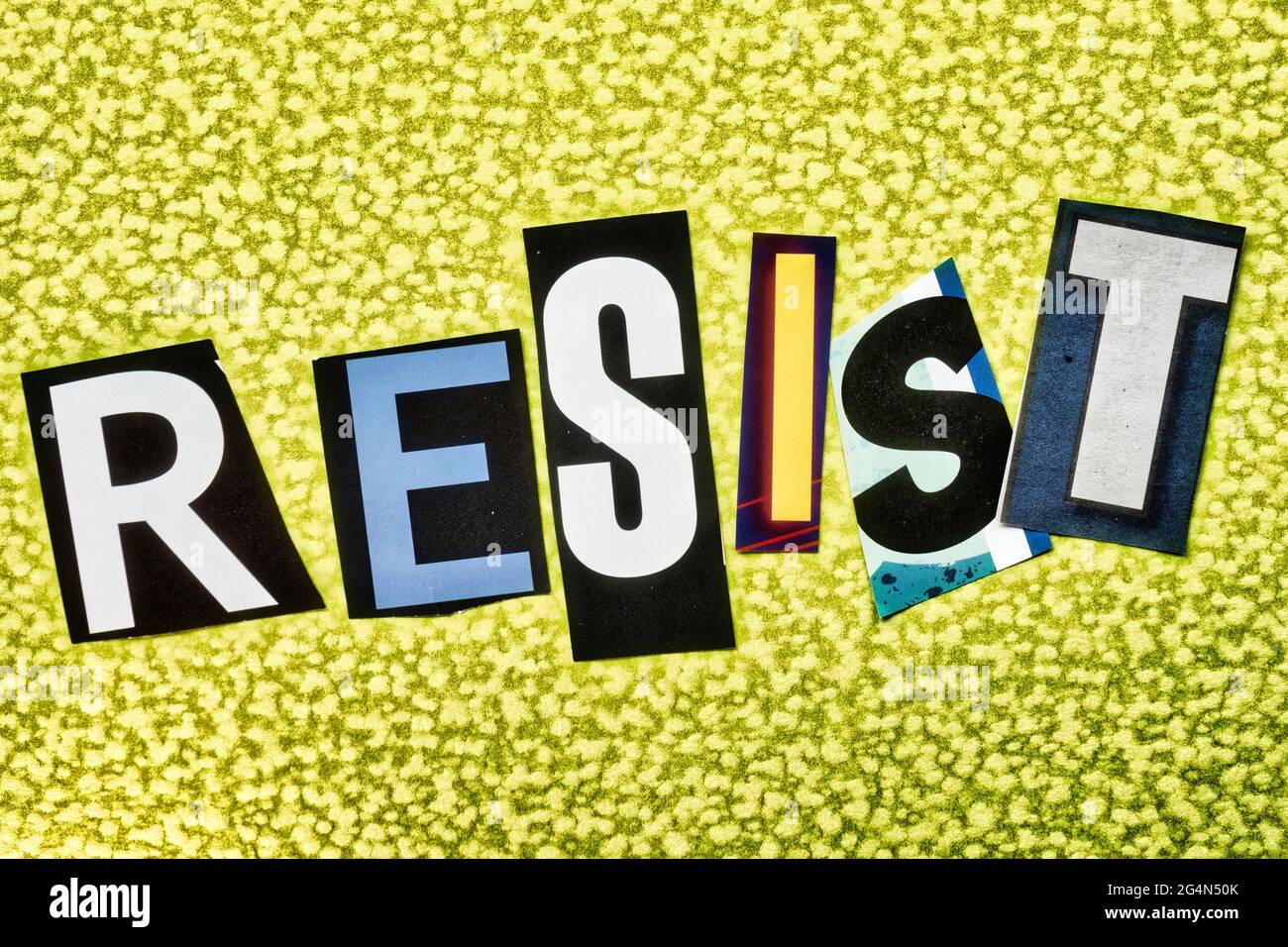 The word "Resist" using cut-out paper letters in the ransom note effect ...
