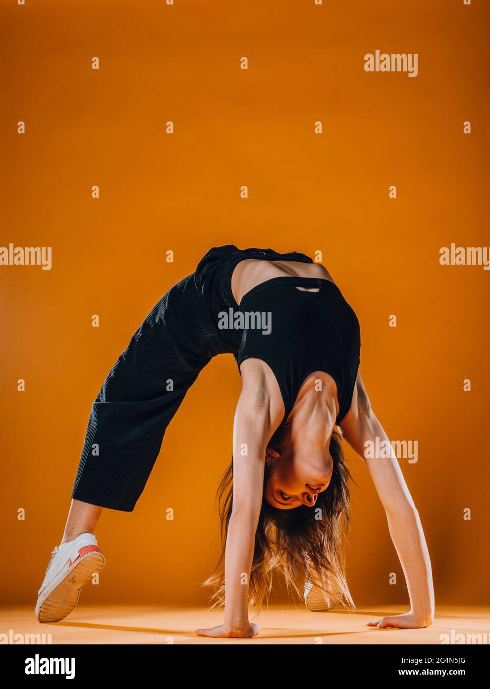 Female dance dancer exercising poses during a dance practice Stock ...