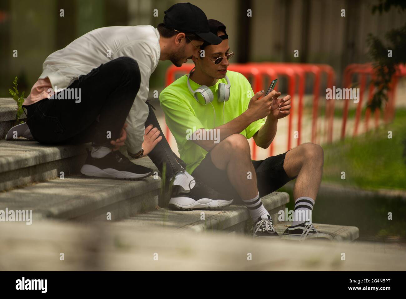 Two boys having conversation hi-res stock photography and images - Alamy