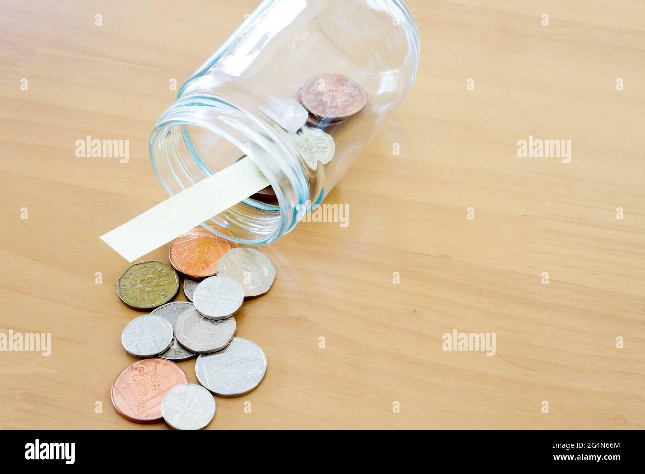 Overflowing money jar hi-res stock photography and images - Alamy
