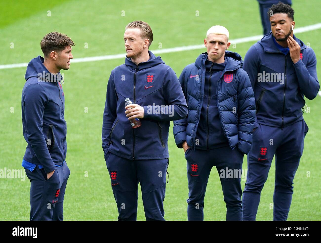 England's John Stones, goalkeeper Jordan Pickford, Phil Foden and Reece ...