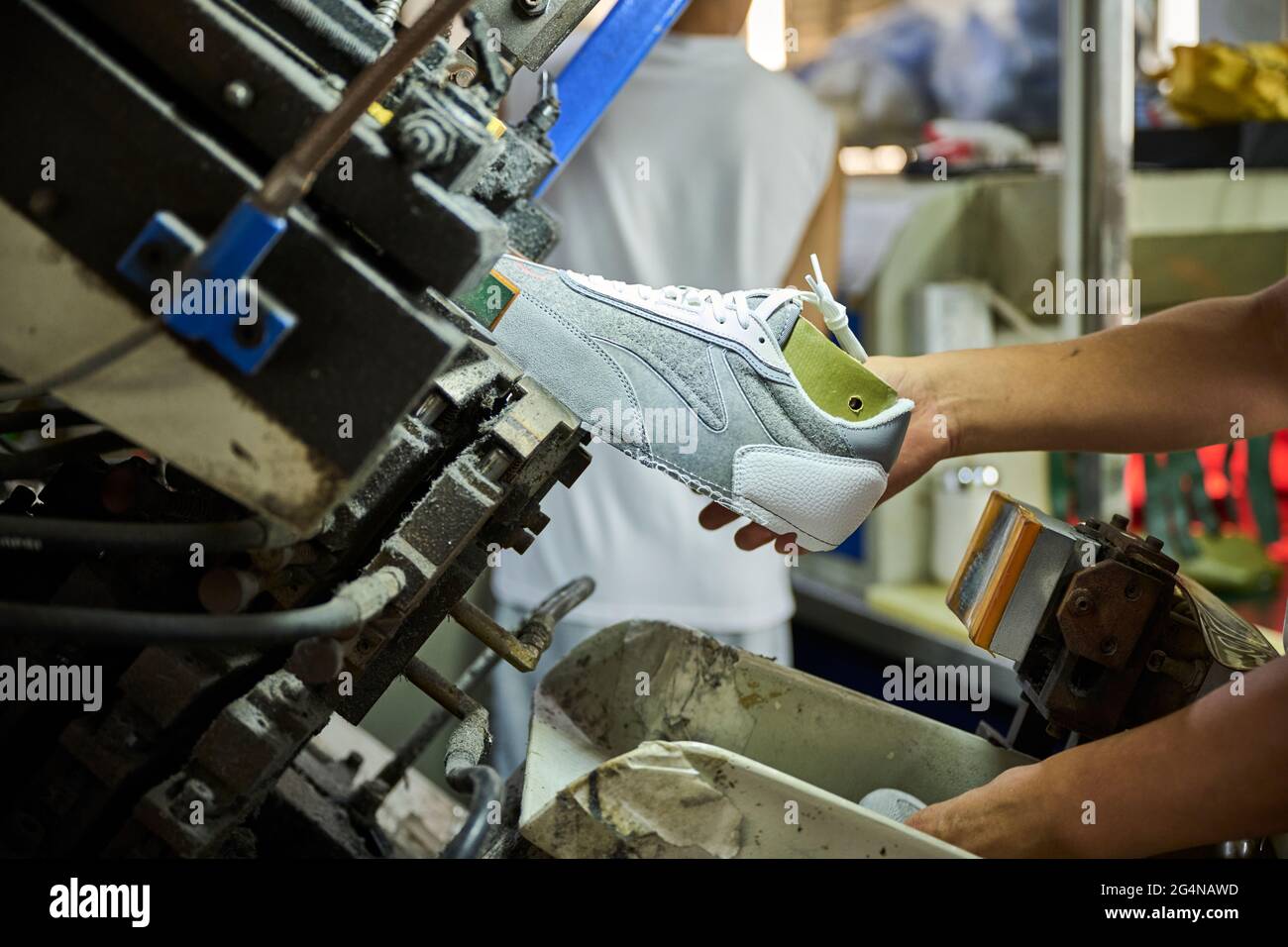 Shoes in assembling process in Chinese factory Stock Photo - Alamy