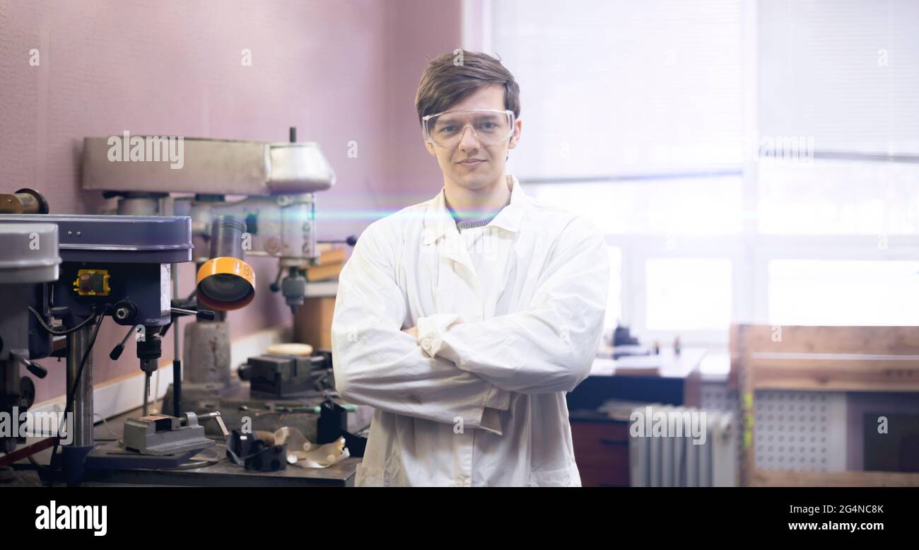 young professional engineer portrait on the production factory ...