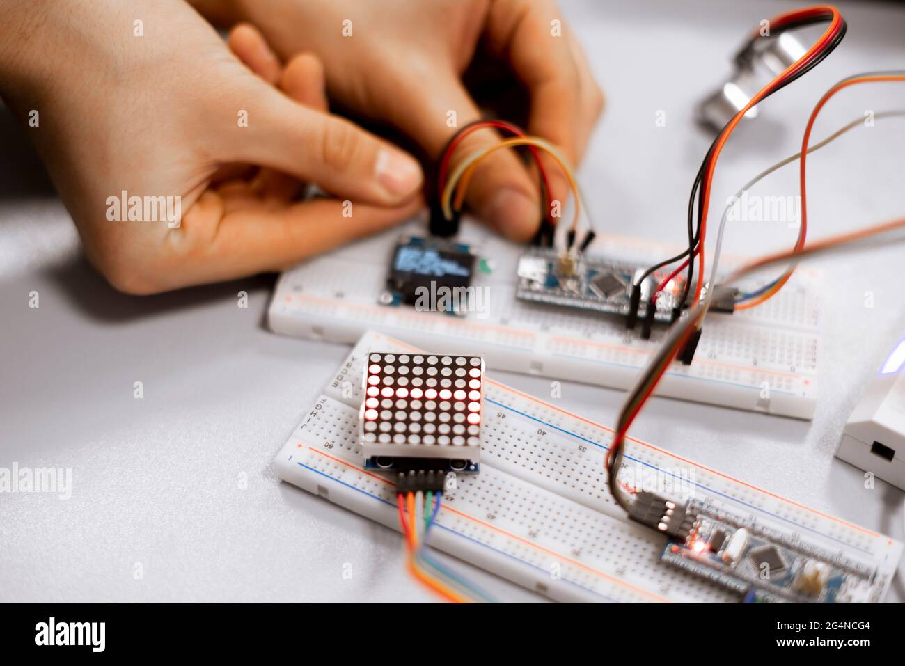 professional engineer assemble the details of device with pcb ...