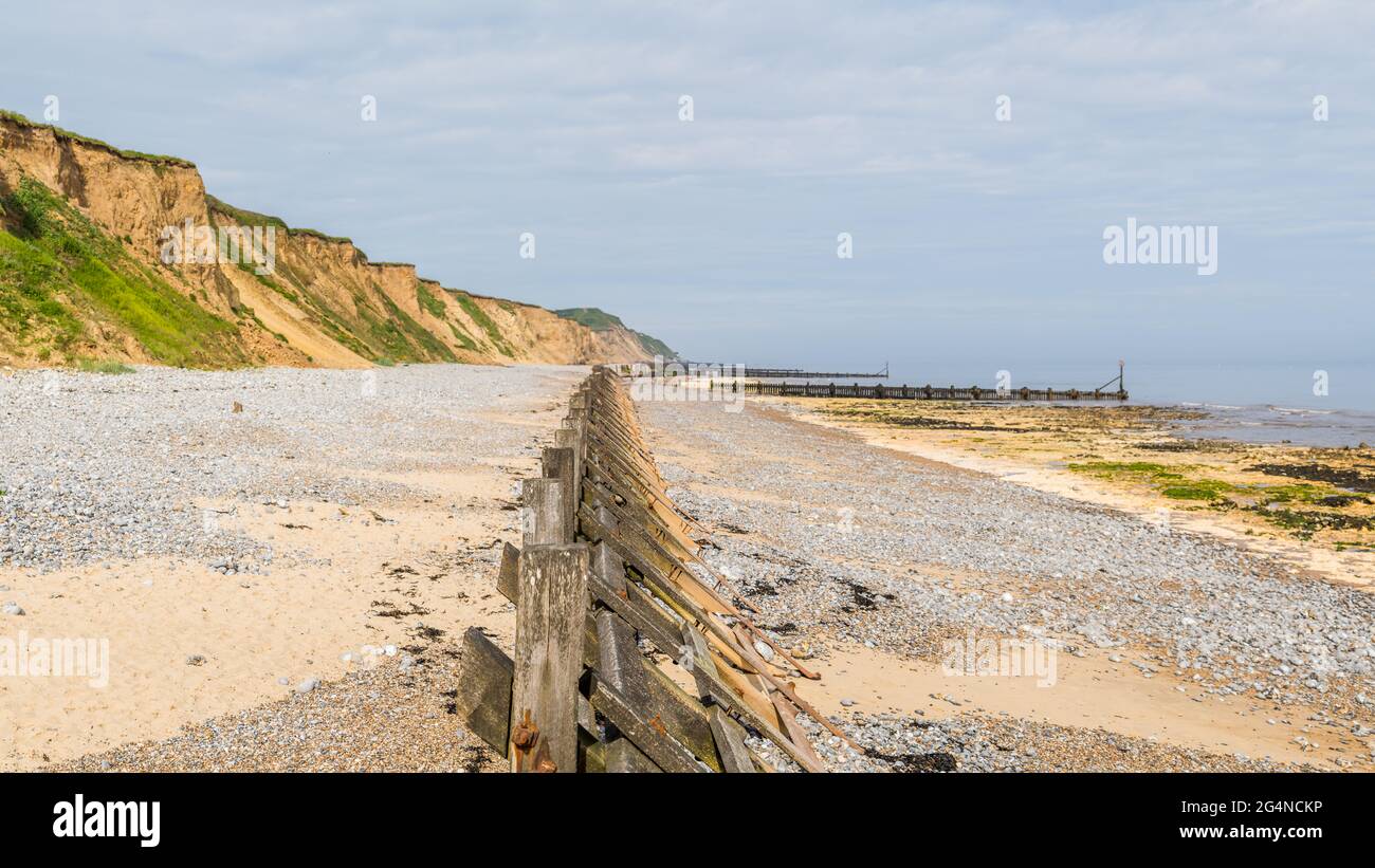 West Runton beach panorama featuring the rock pools, wooden sea ...