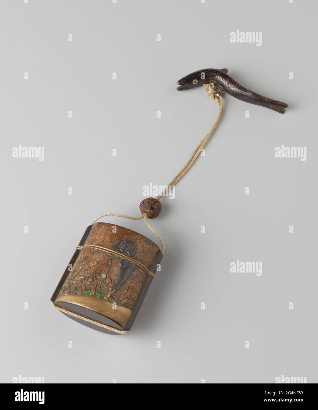 Tobacco box with Netsuke. Tobacco box with Netsuke in the shape of a ...