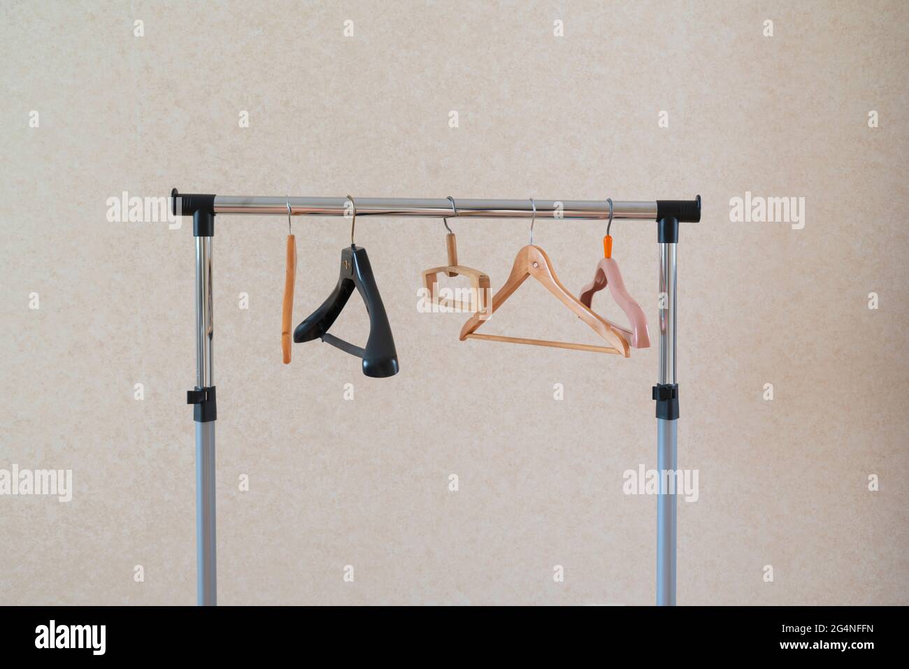 simple empty rail wheel hanger stand near the wall at the hotel Stock ...