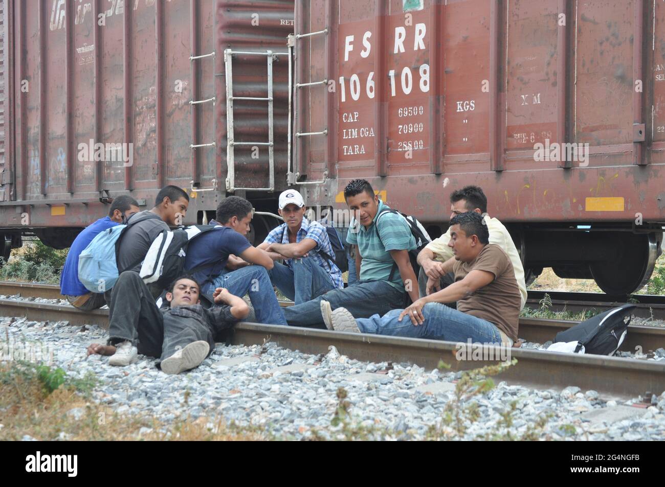 Sitting on train tracks hi-res stock photography and images - Alamy