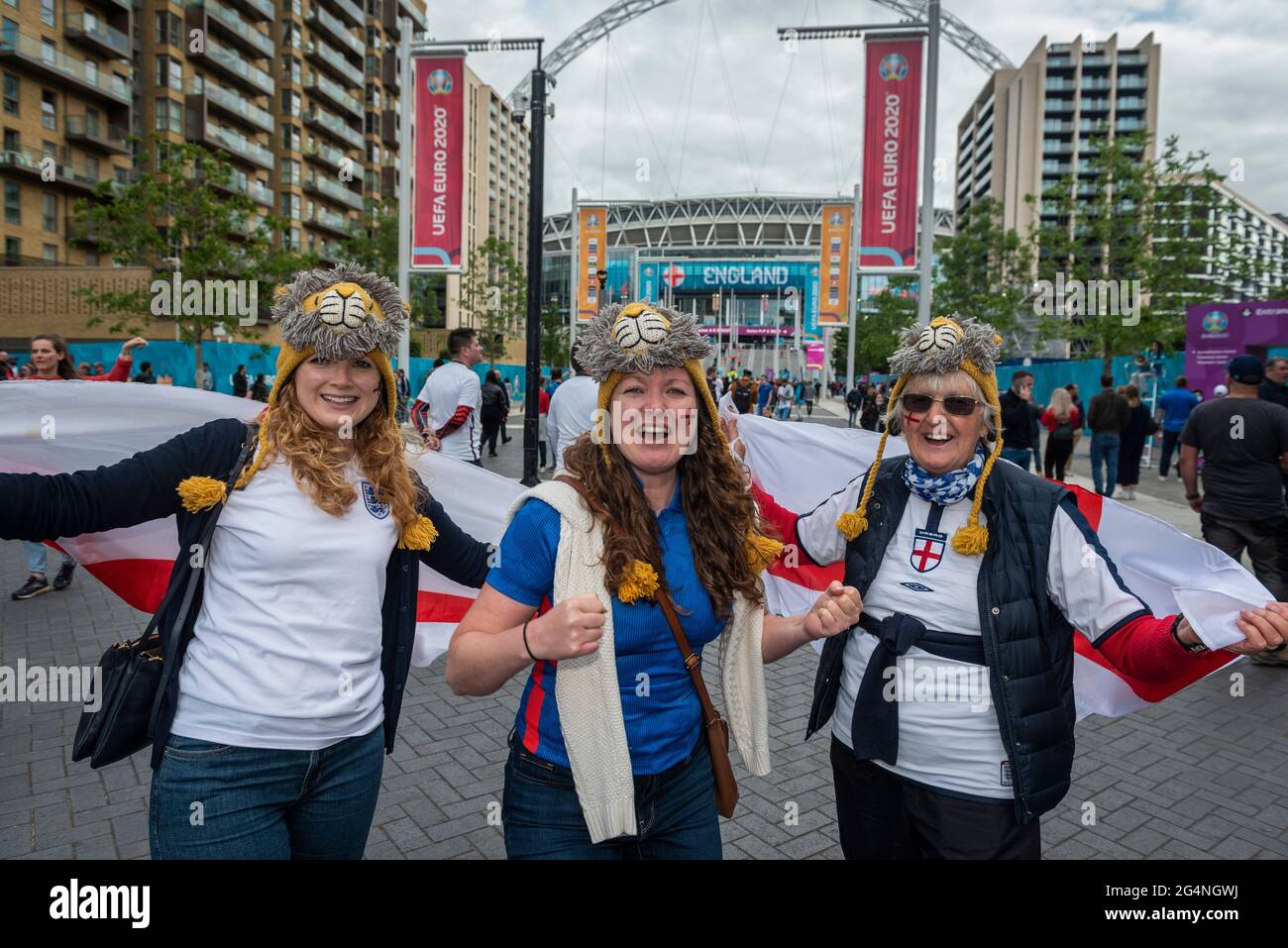 London, UK. 22 June 2021. England fans, showing Three Lions hats, ahead ...