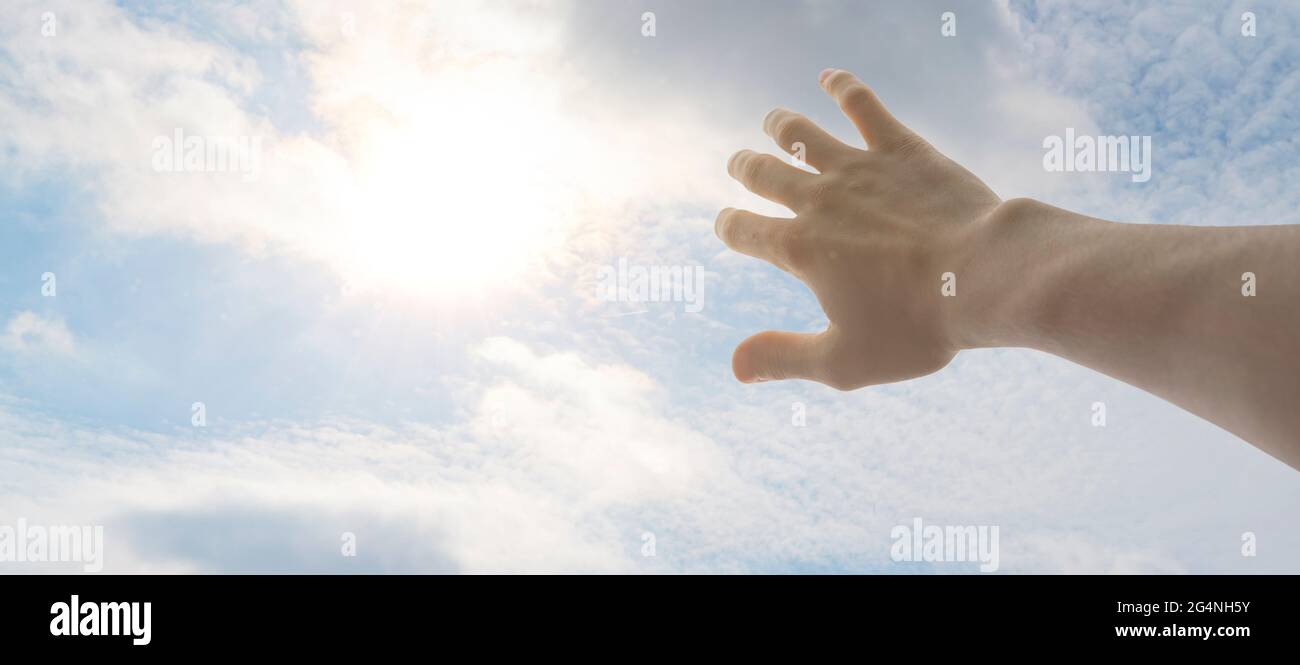 human hand cover himself from the sun light strike from the sky, first ...