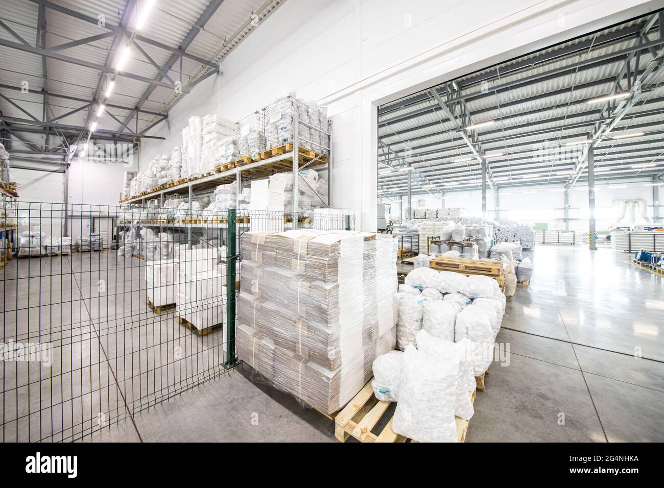 Spacious light interior of a large warehouse in a factory with special ...