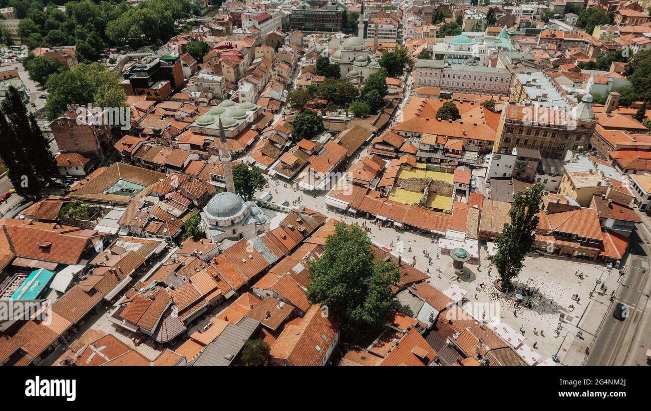 Aerial view of a town with beautiful buildings surrounded by nature ...