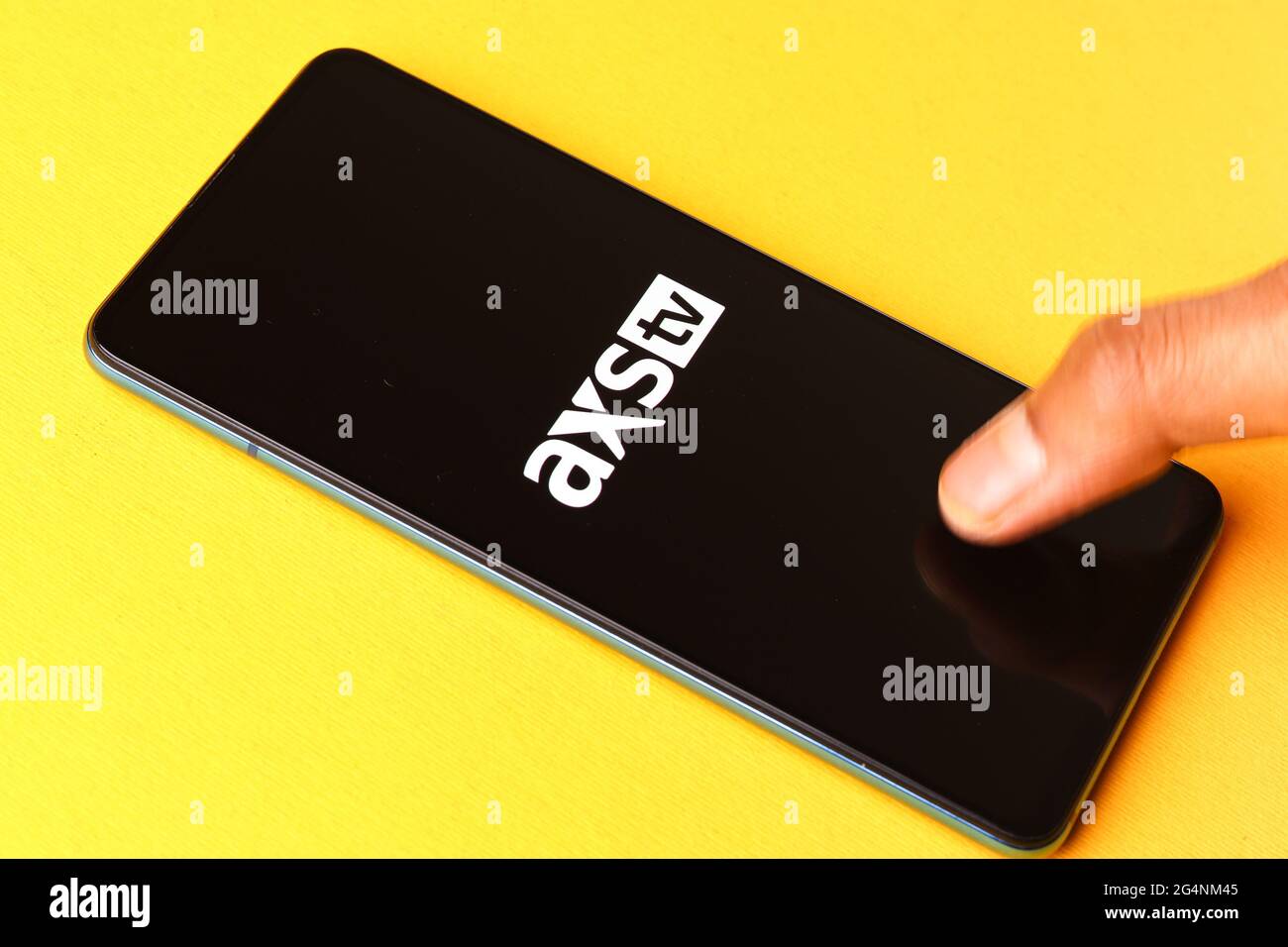 AXS TV logo on phone screen stock image Stock Photo - Alamy