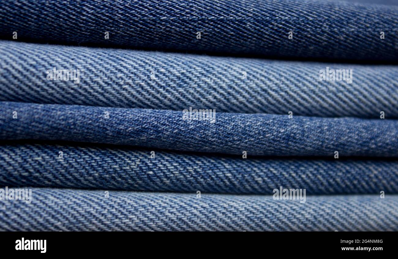 A stack of denim. Color denim close-up texture Stock Photo - Alamy