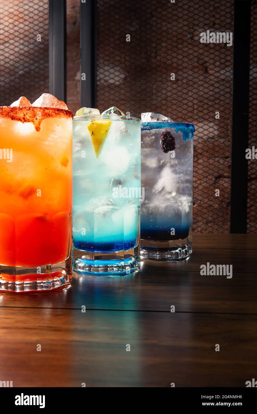 Vertical shot of tropical alcoholic cocktails in the bar Stock Photo ...